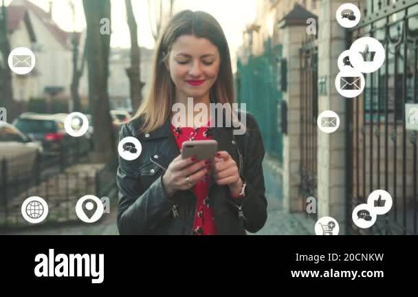 NEW YORK - 5 March, 2020: Close up young woman walk use phone loud technology internet ...