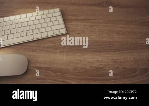 Advertising video image of working desk with computer mouth and ...