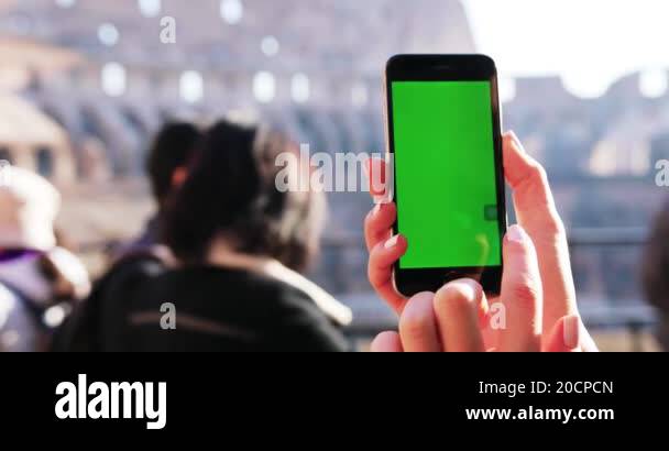 ROME, ITALY - May 19, 2017 : Close up hand young woman hold use phone ...