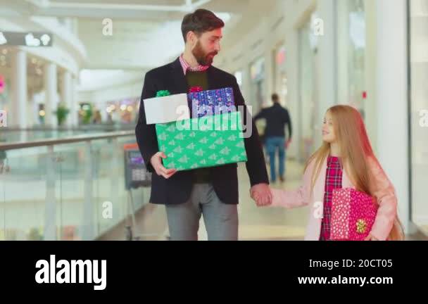 NEW YORK - April 5, 2019: Happy father with daughter bought Christmas ...
