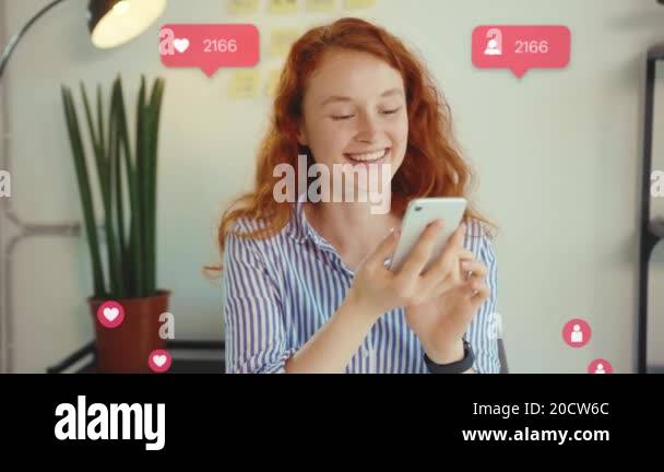 Young woman use phone at office smiling feel happy. Vlogger influencer ...