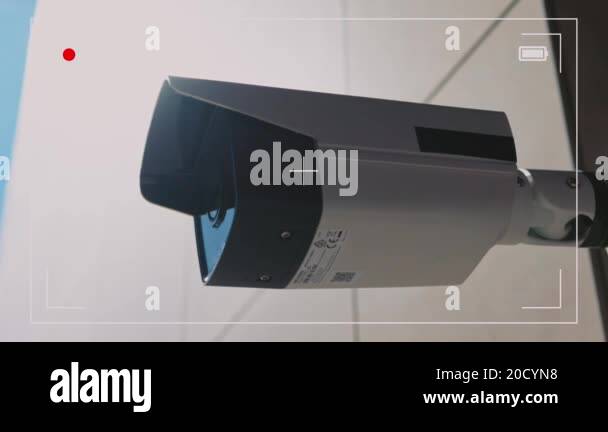 Close up record screen with security camera moving recording outside a ...