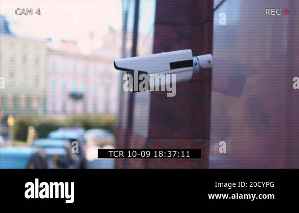 Record screen with security camera moving recording outside a building ...