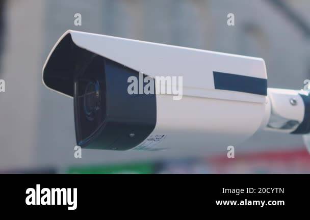 At sunlight security camera moving recording outside a building. CCTV ...