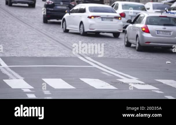 KYIV, UKRAINE OCTOBER 21, 2024 : Crowd of people on a crosswalk, slow ...