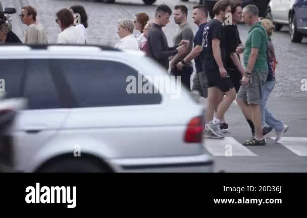 KYIV, UKRAINE OCTOBER 21, 2024 : Crowd of people on a crosswalk, slow ...