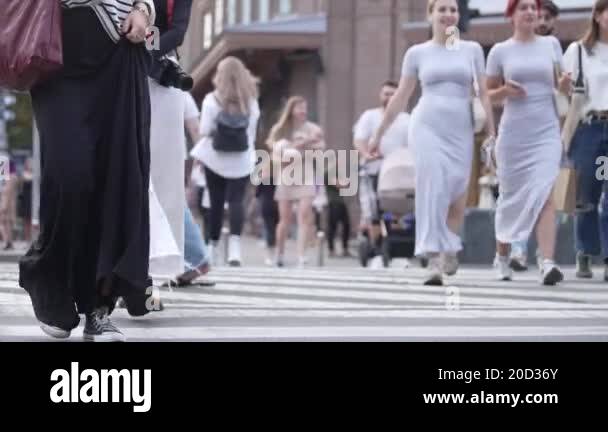 KYIV, UKRAINE OCTOBER 21, 2024 : Crowd of people on a crosswalk, slow ...