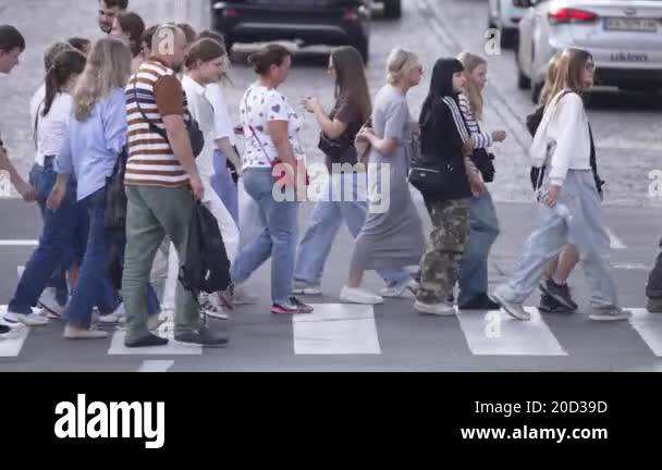 KYIV, UKRAINE OCTOBER 21, 2024 : Crowd of people on a crosswalk, slow ...