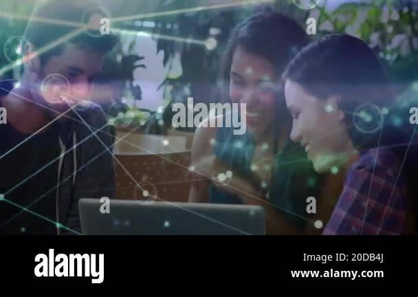 Networking and data connections animation over friends laughing around ...