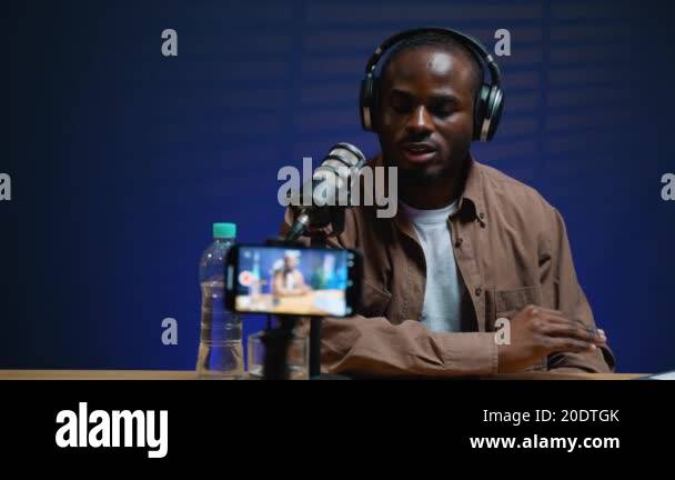 African-American blogger passionately records a new vlog, encouraging ...