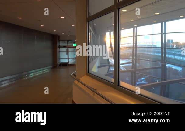 Stockholm, Sweden A long access hallway at Arlanda Airport Stock Video ...
