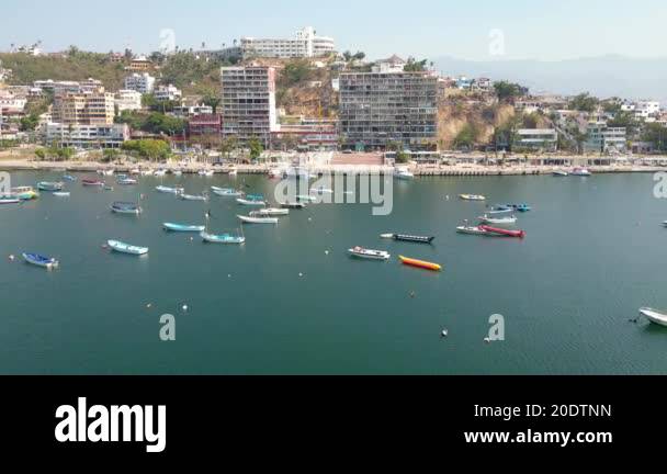 A drone video advancing toward the Paseo del Pescador in Acapulco ...