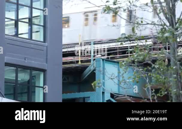 New York elevated subway, metropolitan bridge, metro track above street ...