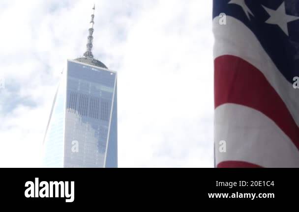 New York, american flag waving. World Trade Center. Manhattan downtown ...