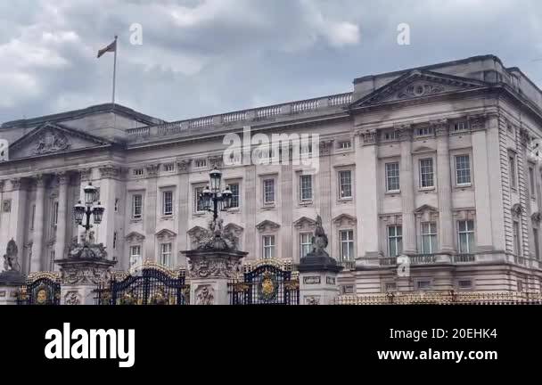 The grand facade of Buckingham Palace, adorned with intricate details ...