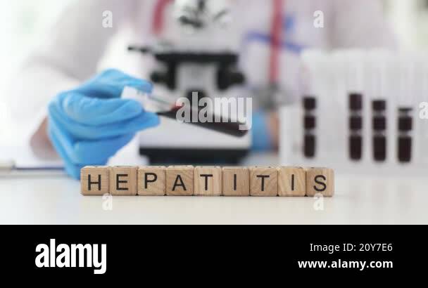 Laboratory analysis of hepatitis with blood samples. Researcher ...