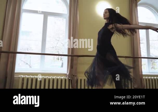 The prima ballerina performs circular movements in the centre of the ...