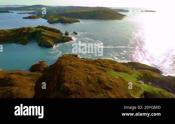 This video features stunning aerial views of a tranquil island in a ...