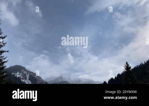 Bright winter morning in the mountains. Blue sky, sunlight, snowdrifts ...