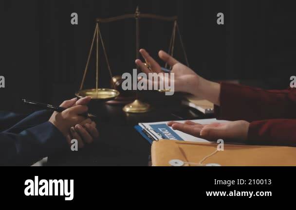 businessman lawyer working on a legal document in courtroom with law ...