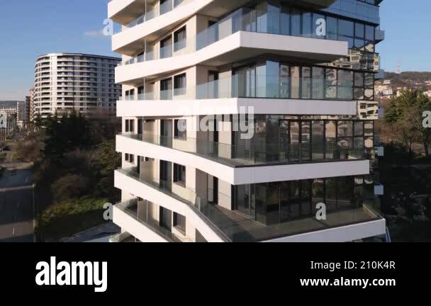 A stunning multi-story building showcases contemporary architecture ...