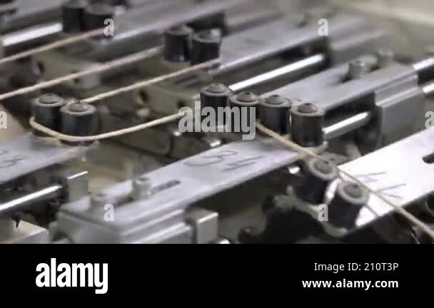 Corrugated cardboard making machine during operation. Special details ...