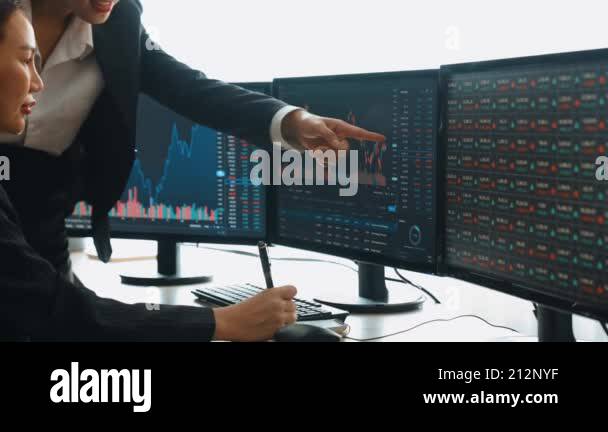 Slow motion business investors in stock trading company analyzing stock ...