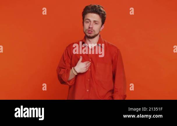 I will not say anything. Frightened young man closing mouth with hands ...