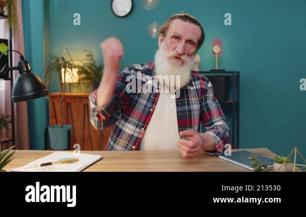 Conflict quarrel negotiation. Portrait of angry senior man engaged in ...