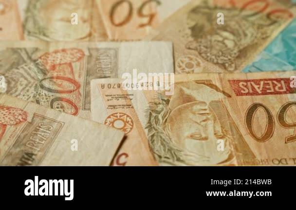 Brazilian banknotes featuring various denominations of reais showcasing ...