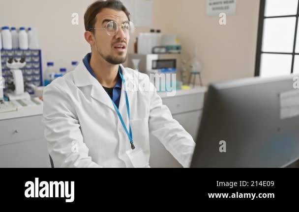 Frustrated young hispanic man in lab coat with beard in a laboratory ...