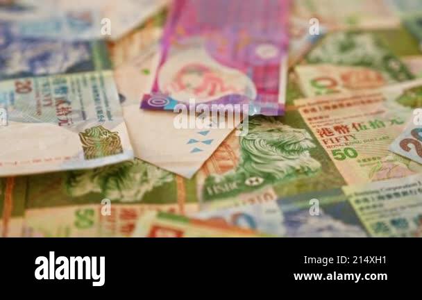 Hong kong dollar banknotes spread randomly capturing the rich details ...