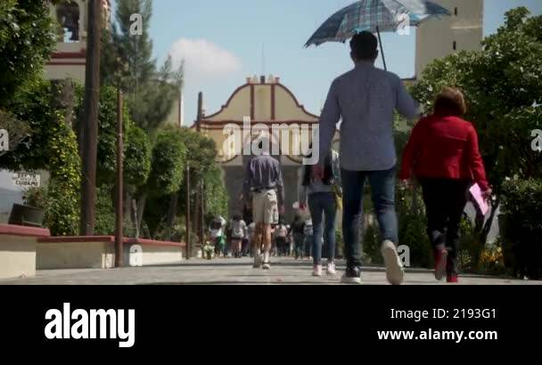 Quecholac, Puebla, Mexico. November 2, 2024. People walking to the ...