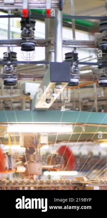 Vertical, Weaving of fabric on cars. Production of fabric from threads ...