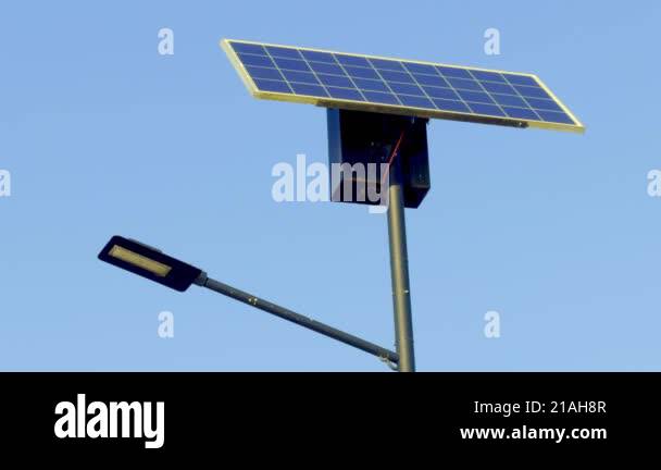 A solar panel street light installation that harnesses renewable energy ...