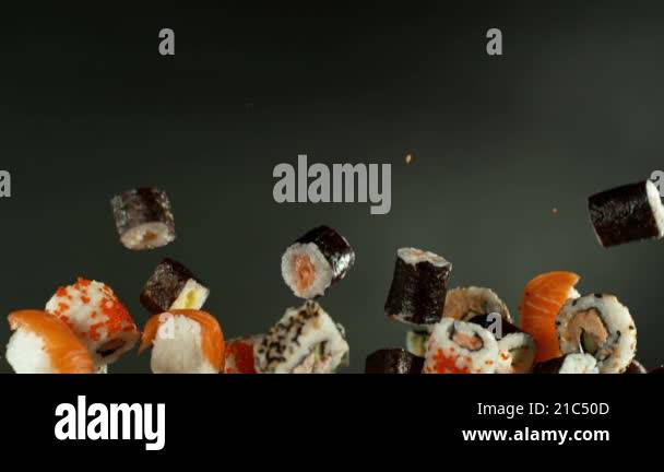 Super Slow Motion Shot of Fresh Sushi Flying in the Air . Filmed on ...