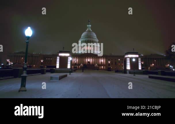 Capitol building in winter snow at night. Winter Capitol hill ...