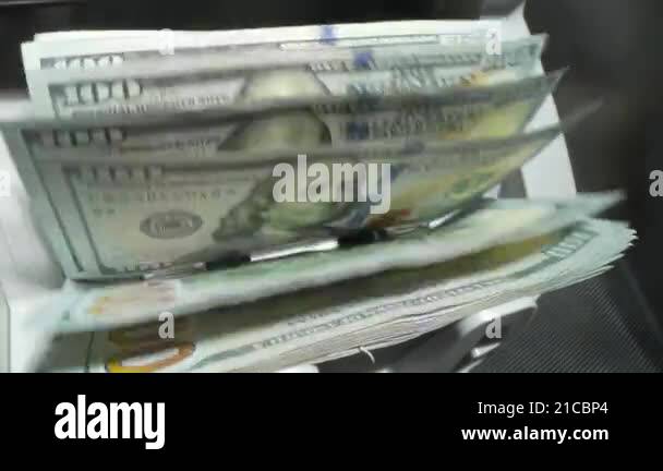 Close up of currency counting machine counting dollar bills. Banknote ...