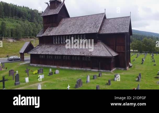 Discover the unique architecture of Udval Stave Church surrounded by ...