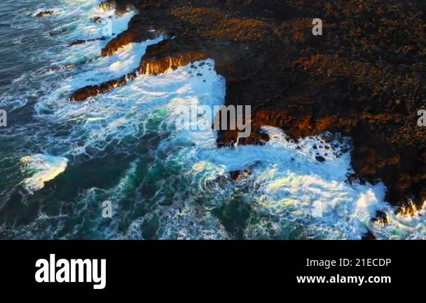 Coast of the Atlantic Ocean in windy weather, Large waves crashing on ...