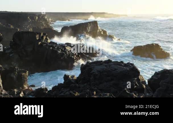 Extreme huge waves crash on the shore, Rocky ocean coast in Iceland ...