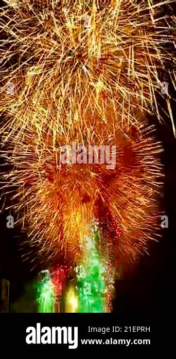 4K. loop seamless of real fireworks background golden shining fireworks ...