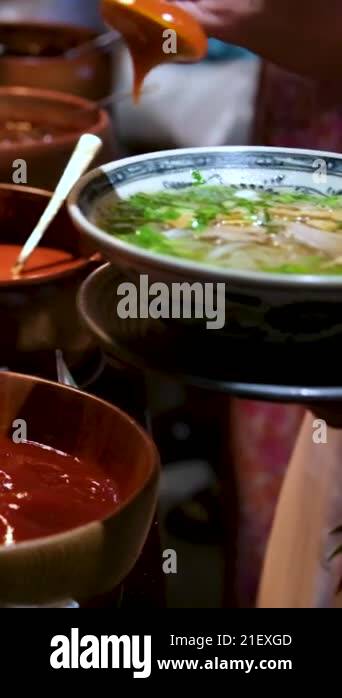 Korean cheese toppoki and Chinese oil dry noodles served with deep ...