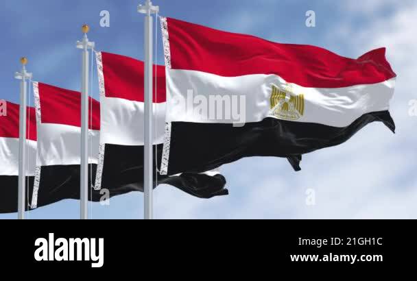 National flags of Egypt waving on a clear day. Horizontal red, white ...