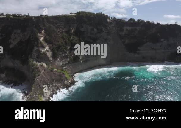 View of the beautiful rocky coast of an island in Indonesia, which is ...