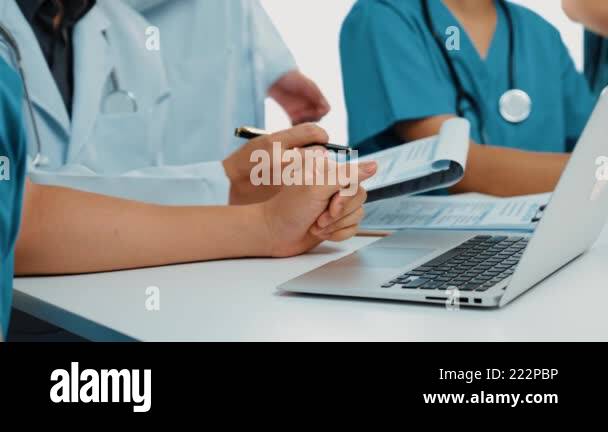 Professional group of medical working and planning medical treatment or ...