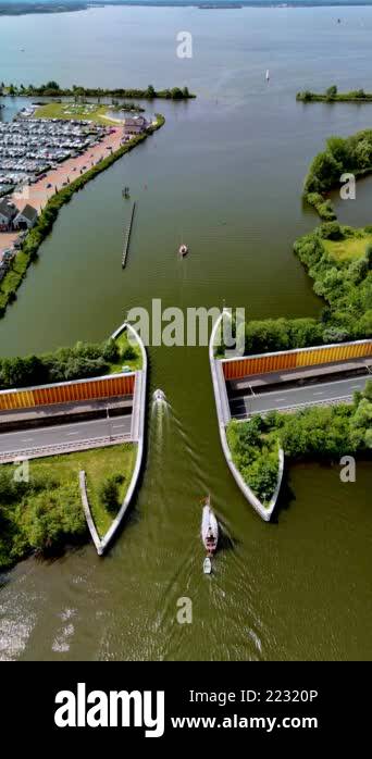 Explore the stunning Veluwemeer Aqueduct in the Netherlands, where ...