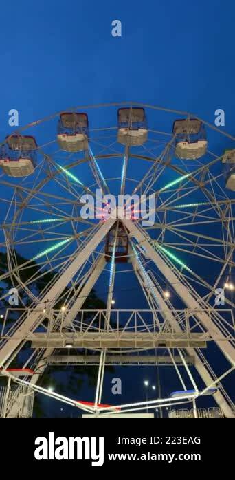 4k footage of giant ferris wheel decorated with interactive LED lights ...