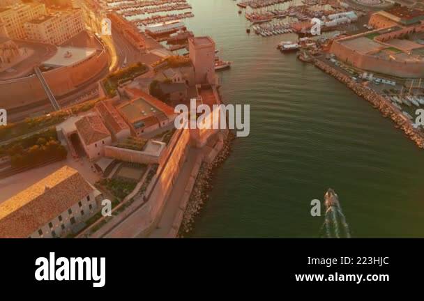 Aerial view of the historic Vieux Port in Marseille at sunrise ...