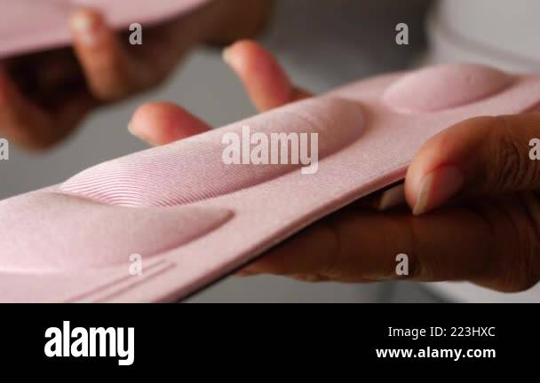 Visual comparison of two shoe insoles showcasing design and texture ...